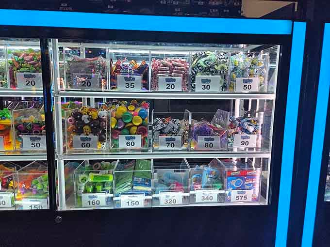 The prize display case showcases treasures ranging from practical to "why do I suddenly need this desperately right now?"