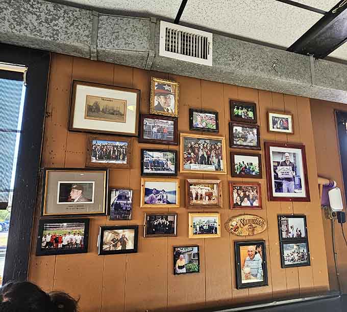 These walls tell stories of Vienna's history through photographs spanning generations of community gatherings and memorable moments together.