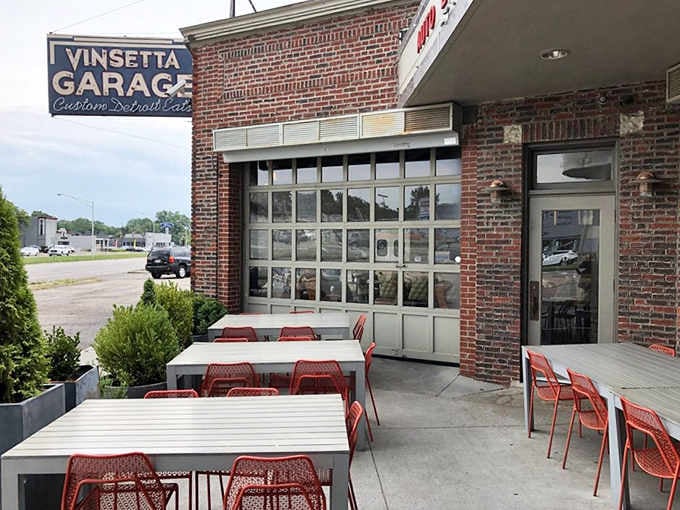 Outdoor seating with those iconic garage doors open transforms any meal into a breezy, memorable occasion.