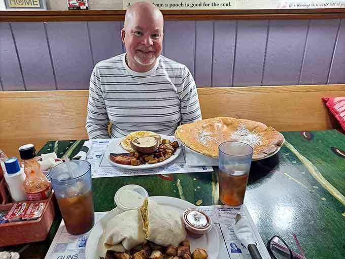 When you see someone grinning like this over breakfast, you know the food delivered exactly what it promised.