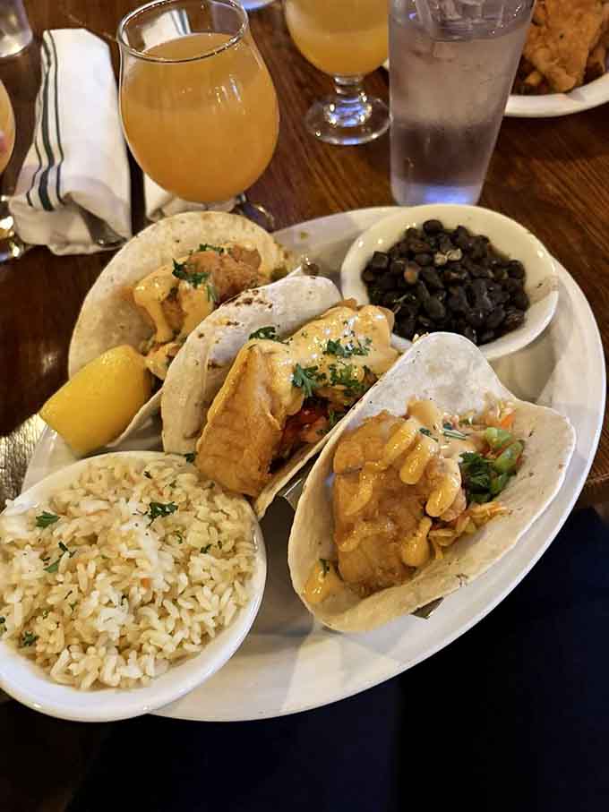 Fish tacos bringing a touch of coastal flair to this historic establishment's diverse menu offerings.