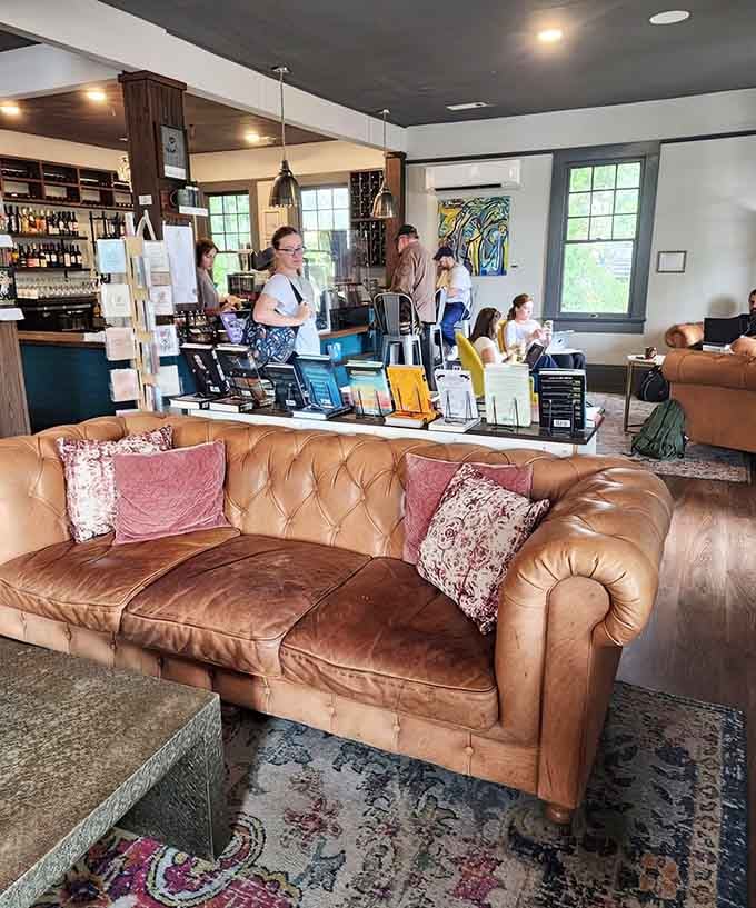 A leather Chesterfield sofa that's seen more plot twists than a mystery novel and welcomed countless readers.