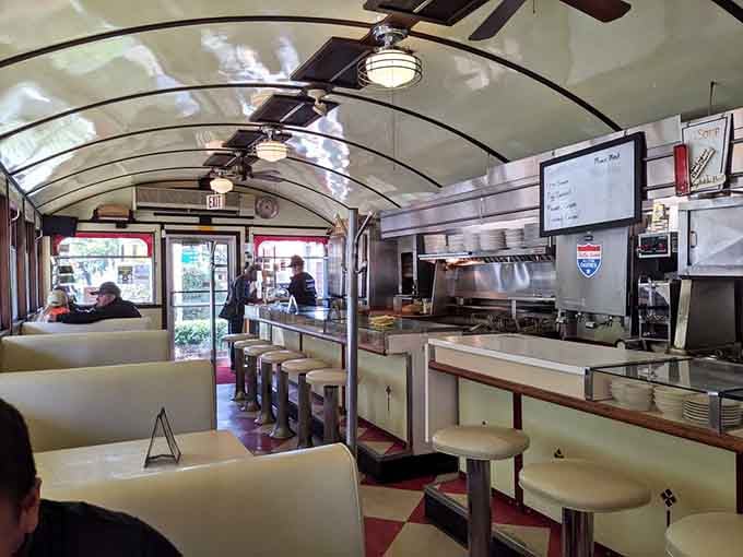 The long counter and cozy booths create that perfect diner atmosphere where strangers become friends over breakfast.