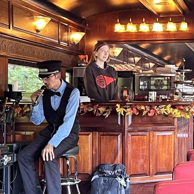 The lounge car's polished wood bar and attentive staff prove that train travel once meant serious style points.