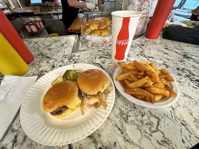 This is what ten bucks gets you: two cheeseburgers, fries, a drink, and memories that'll last way longer.