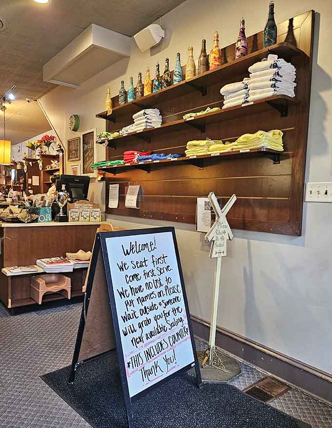 The welcome sign sets the tone: come hungry, leave happy, and maybe grab some Dutch merchandise too.