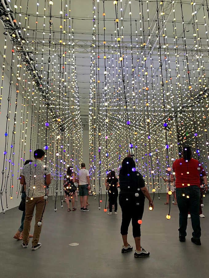 Suspended lights create an infinite galaxy you can actually walk through without needing a spaceship or Tang.