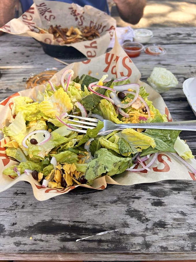 Even the salad arrives looking like it partied with the rest of the menu, fresh and unapologetically generous.