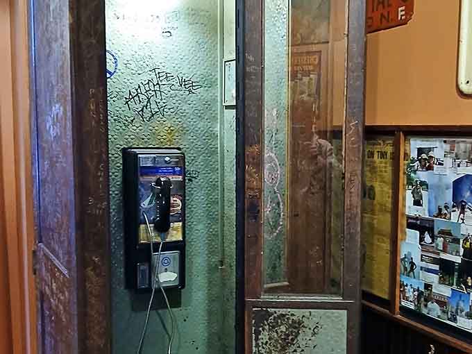 An actual working payphone, because Yesterdog commits to the retro vibe harder than anyone you know.