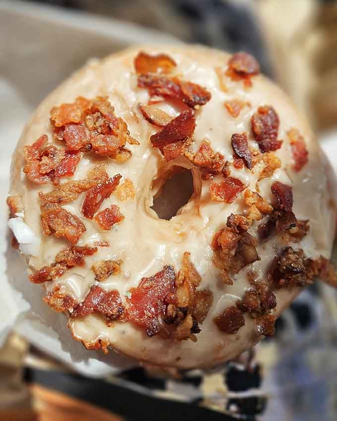 Maple bacon donuts prove that whoever first combined sweet breakfast pastry with crispy pork deserves a Nobel Prize.