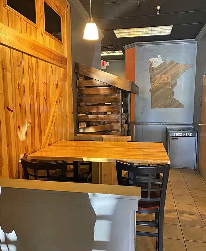 Comfortable seating and rustic wood accents create a relaxed atmosphere where the food remains the undisputed star of the show.