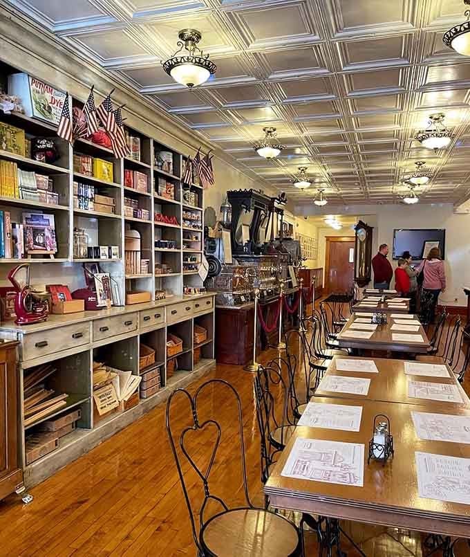 Tin ceilings, wooden floors, and antique displays create an atmosphere where even your smartphone feels slightly out of place.