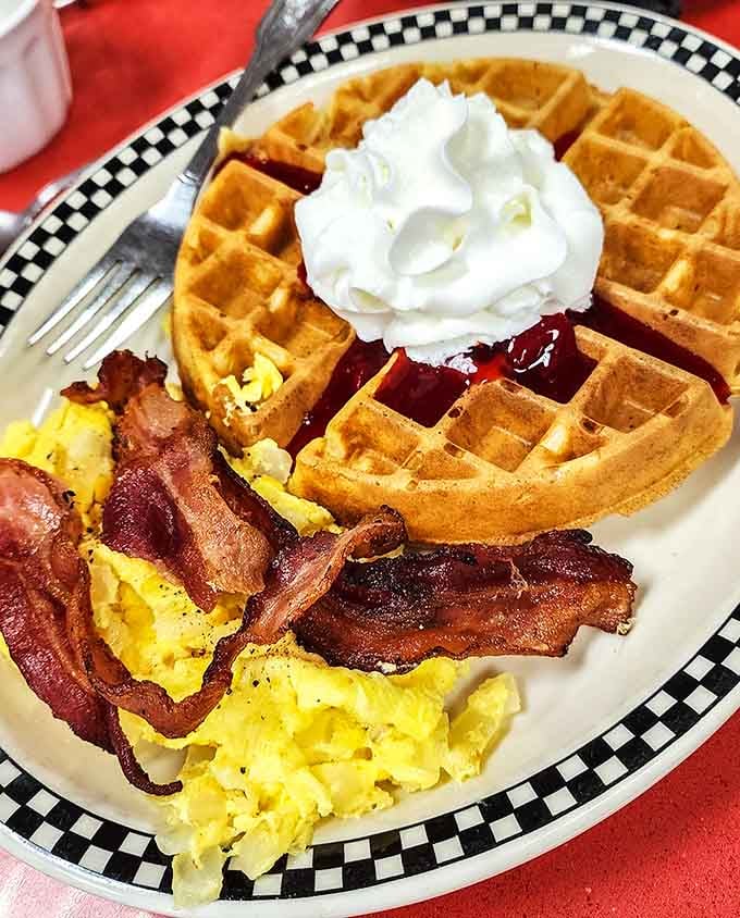 Belgian waffles with bacon and eggs deliver that sweet-and-savory breakfast combo that makes mornings worth facing with enthusiasm.