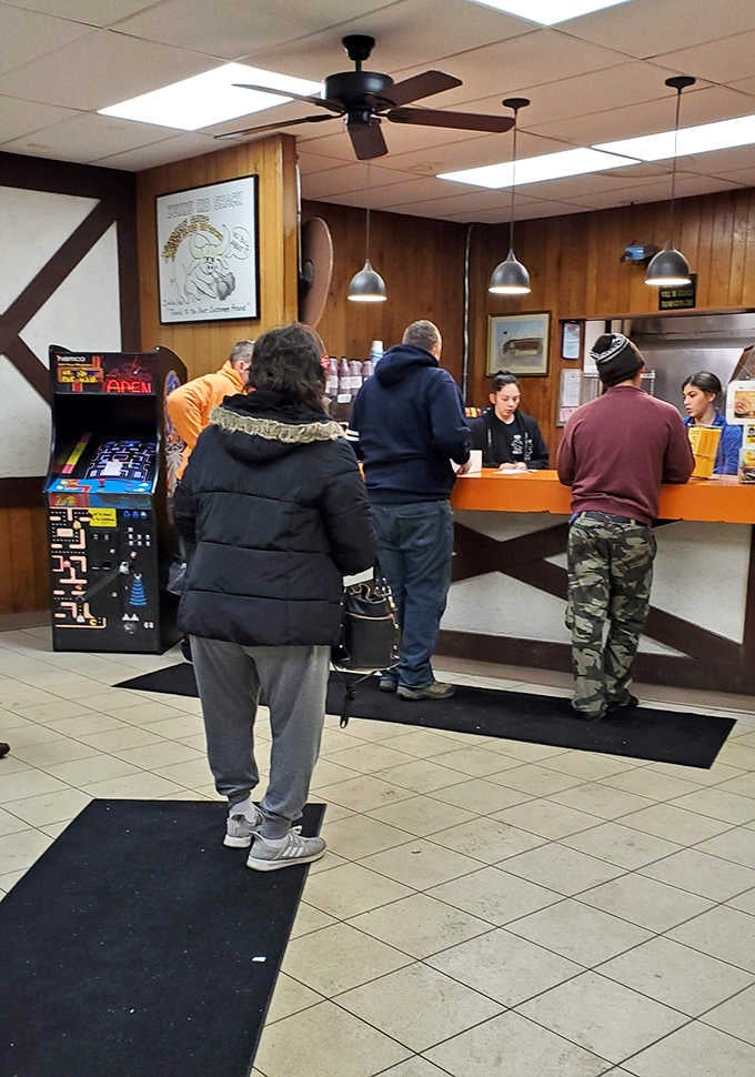 The line forms early at Zukin's, where patience is rewarded with smoky, fall-off-the-bone perfection worth every second.