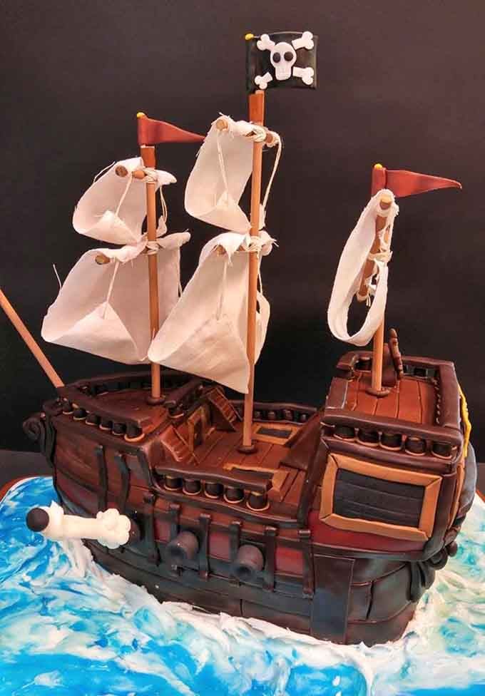 This elaborate pirate ship cake is the stuff of childhood dreams, complete with sails and a skull-and-crossbones flag.