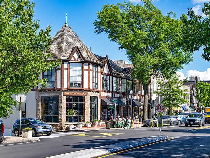 That Tudor-style corner building looks like it wandered over from an English village and decided to stay.