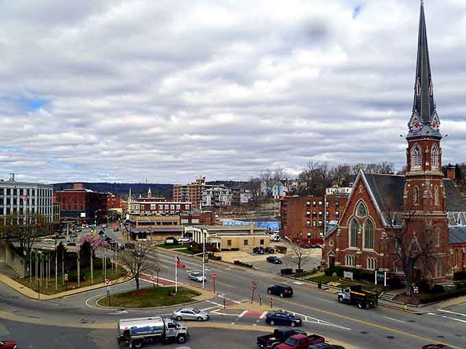 A striking church spire punctuates the skyline, reminding you that some towns still have landmarks worth looking up to see.