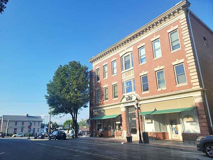 Morning light bathes classic storefronts in golden warmth that no Instagram filter could ever replicate.