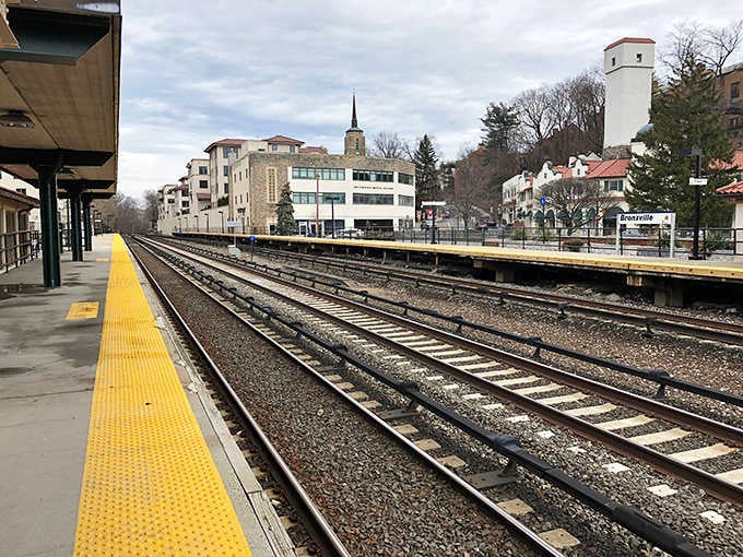 Train tracks stretch toward a charming downtown where commuters become neighbors who actually know each other.