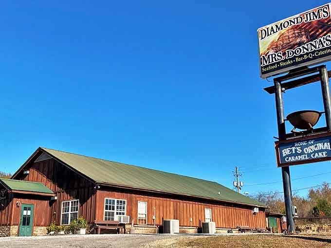 Rustic wood siding and green roof create that cabin-in-the-woods feeling where hearty meals await hungry adventurers.