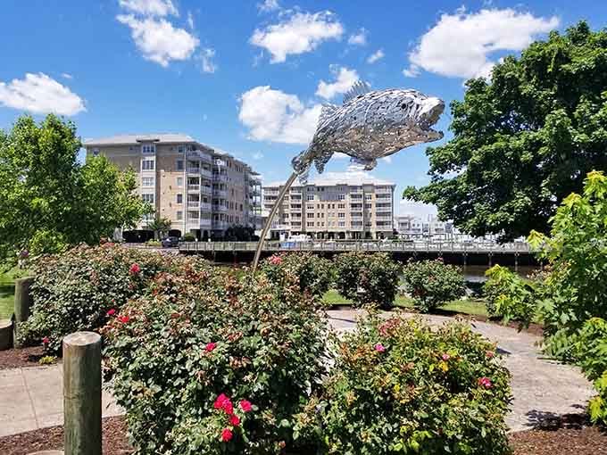 A leaping fish sculpture celebrates the waterfront heritage that defines this community's very soul.