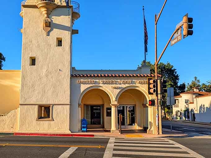 That lighthouse-style post office tower stands as a quirky reminder that mail delivery can have personality too.