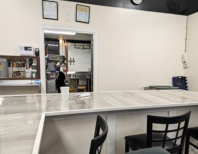 The kitchen window offers a glimpse into where breakfast magic happens, one burrito at a time.