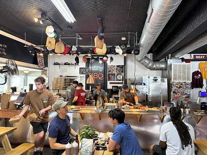 The open kitchen lets you watch the magic happen as staff craft each order with precision.