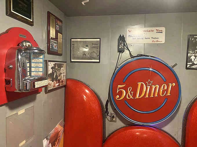 Vintage memorabilia covering the walls creates an authentic museum experience where you can actually eat the exhibits.