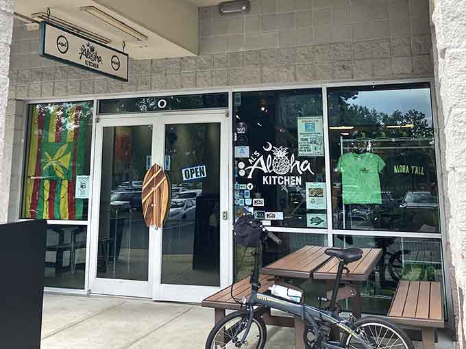 That wooden surfboard door handle is your first clue that someone here really sweats the delightful details.