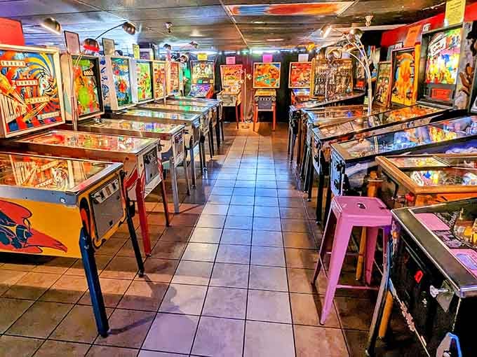 An endless corridor of pinball machines stretches ahead, each one promising a different adventure and challenge.