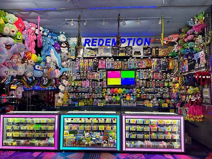 The redemption counter overflows with prizes that you absolutely don't need but definitely want anyway.