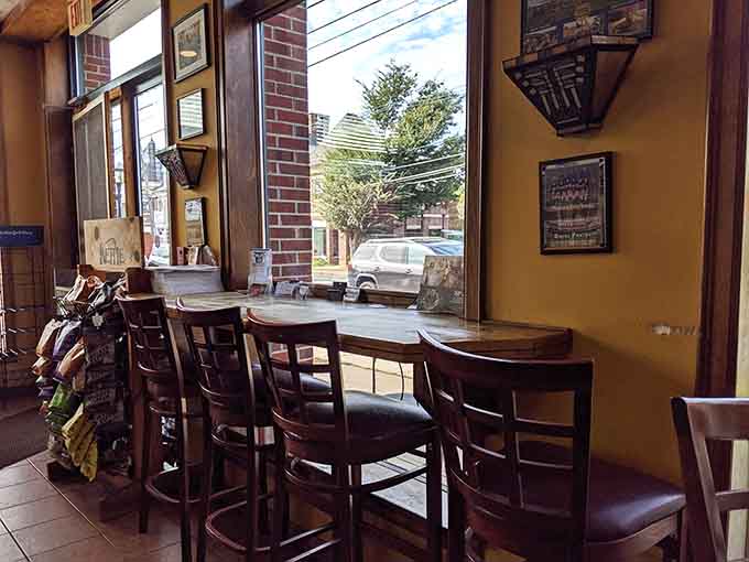 Window seats offer the perfect perch for enjoying your bagel while the world passes by outside those big windows.