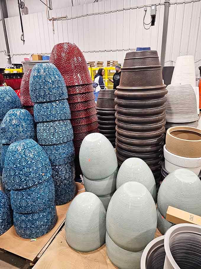 Decorative planters stacked like modern sculpture prove your garden can look magazine-worthy on a realistic budget.