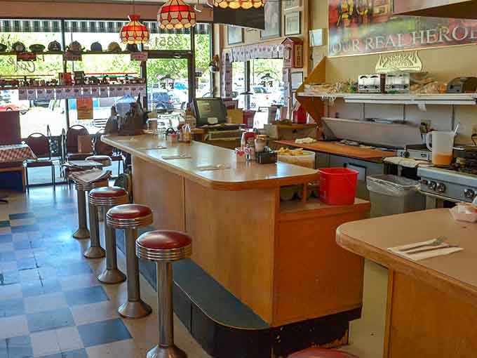 Classic diner counter seating lets you watch the magic happen while your breakfast sizzles on the griddle.