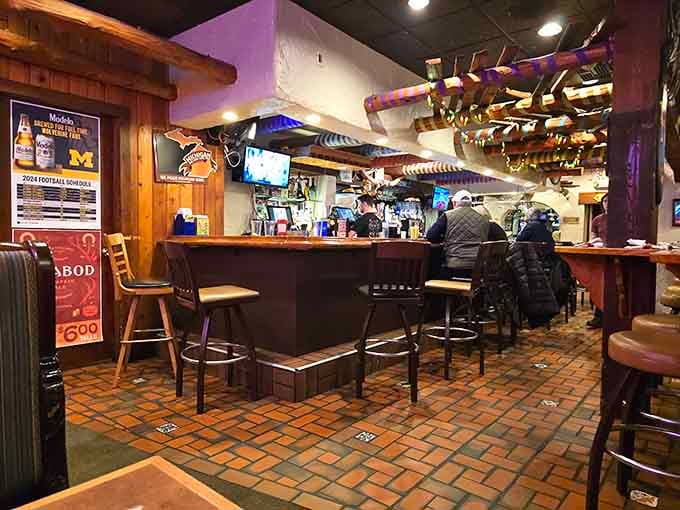 The bar area where cold drinks and warm conversation have been flowing for over seven decades strong.