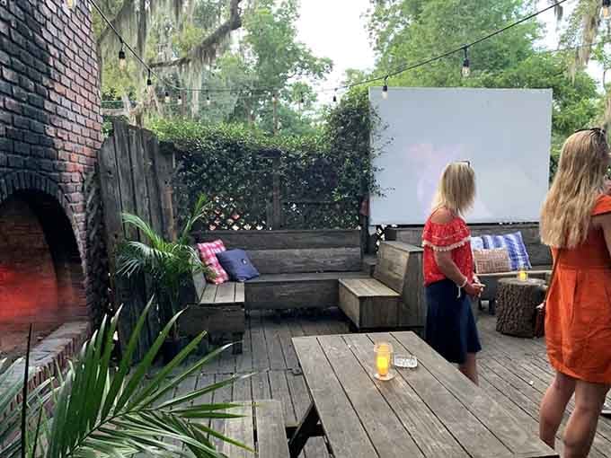 The outdoor patio provides a charming spot for al fresco dining under those gorgeous moss-draped Georgia oaks.
