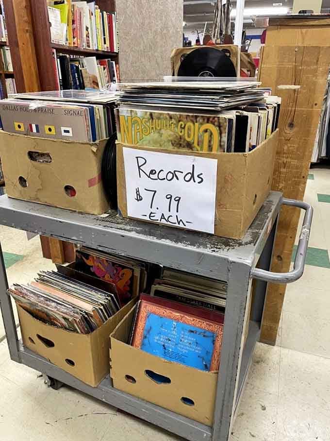 Vinyl records stacked in boxes, each one a potential soundtrack to your life for less than a latte.