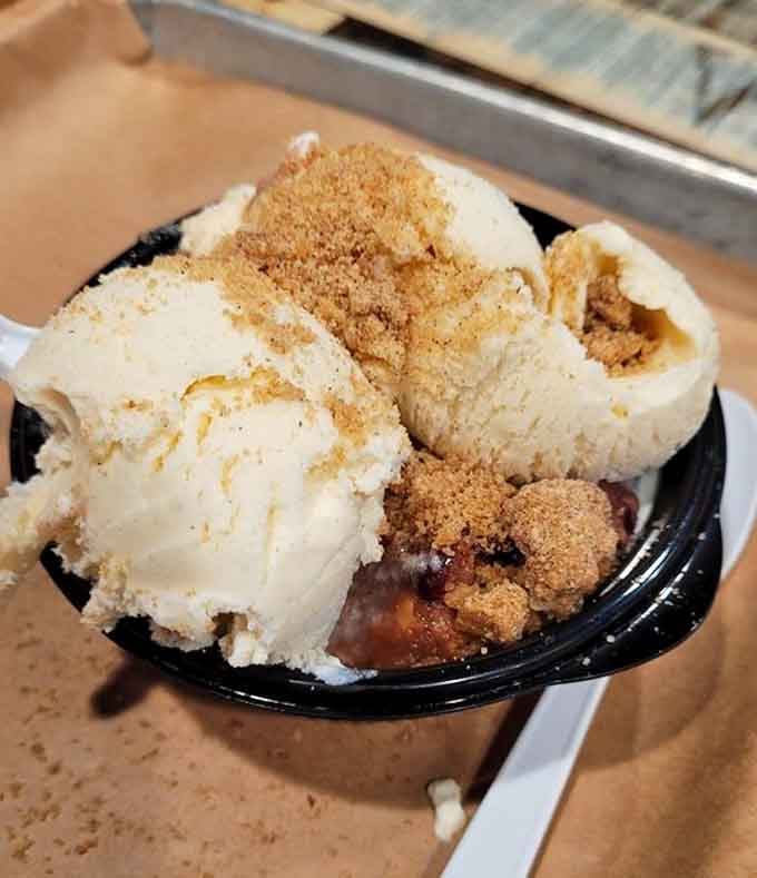 Warm cobbler with ice cream proves that sometimes the simplest pleasures are actually the most profound.