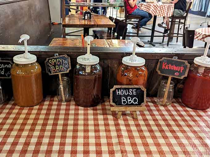 A lineup of house-made BBQ sauces lets you customize every bite from sweet to spicy to somewhere gloriously in-between.