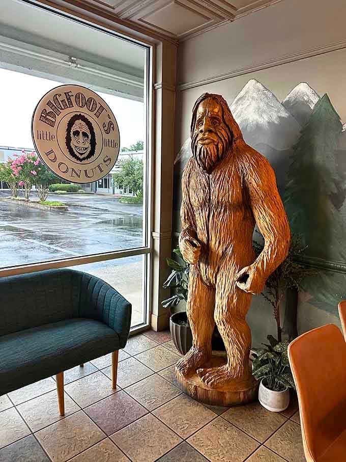 That life-sized wooden Sasquatch statue guards the window like a delicious secret worth protecting.