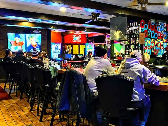 Locals gathering at the bar, where everyone knows your name and your usual order too.