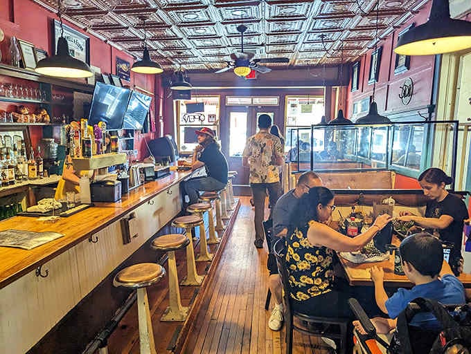 Families gathering around wooden tables where miners once walked, history serving as the ultimate dining companion here.
