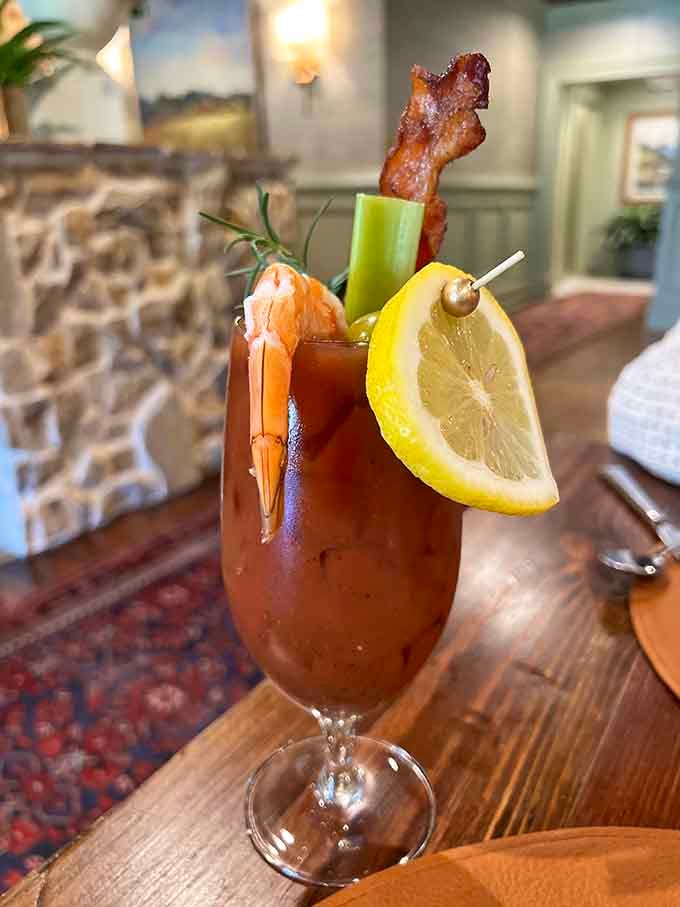 That Bloody Mary comes garnished with enough toppings to qualify as a meal, including bacon because everything's better with bacon.