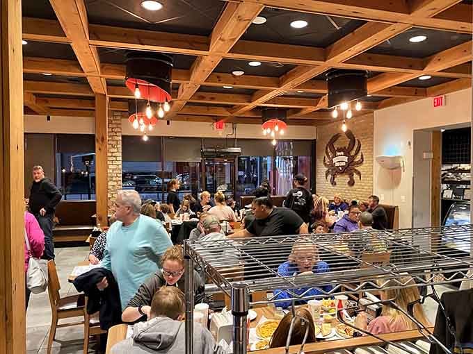 A packed dining room proves that word spreads fast when someone's doing both pizza and crab cakes exceptionally right.