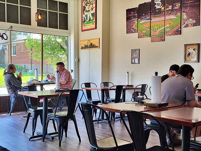 Real people enjoying real sandwiches in a space that feels welcoming and wonderfully unpretentious.