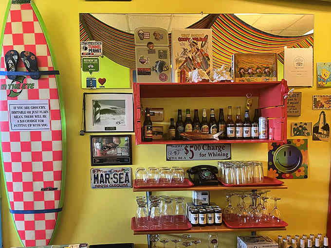 Beach vibes meet artistic flair on walls that give your eyes something delicious to feast on too.