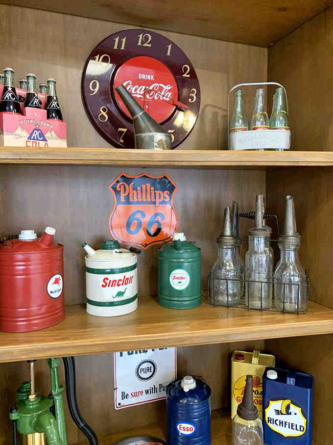 Shelves displaying authentic vintage oil cans and Route 66 signs that collectors would trade their firstborn child to own.