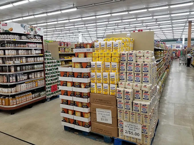 Bulk containers of sugar and staples tower impressively, perfect for serious home cooks who measure ingredients by the pound.