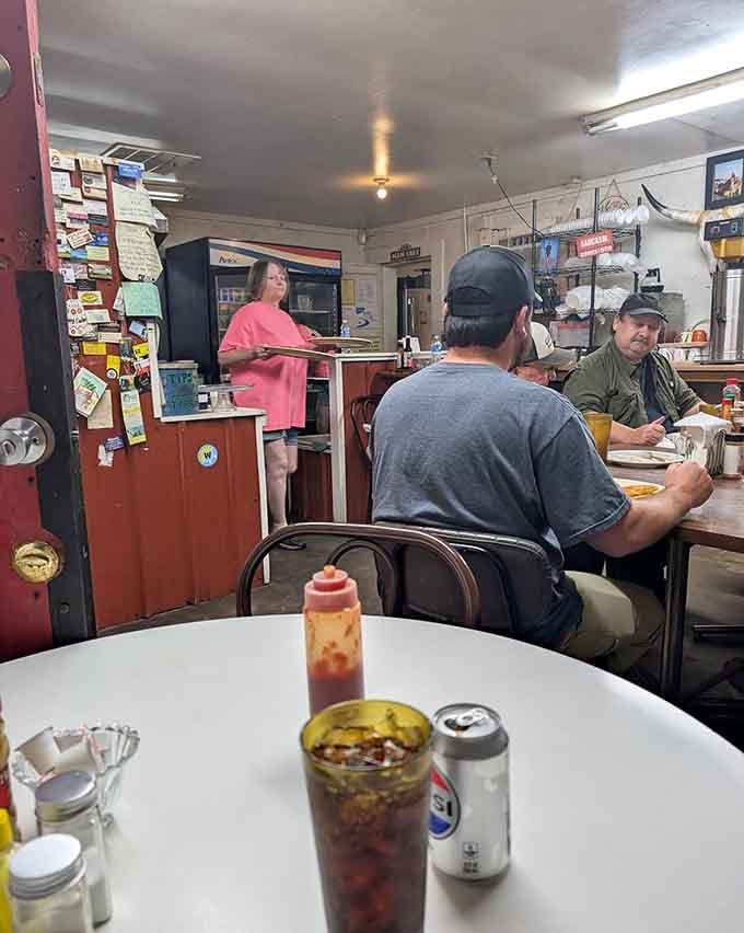Real diners enjoying real food in a real community gathering spot is what makes Carl's Deli special beyond the menu.